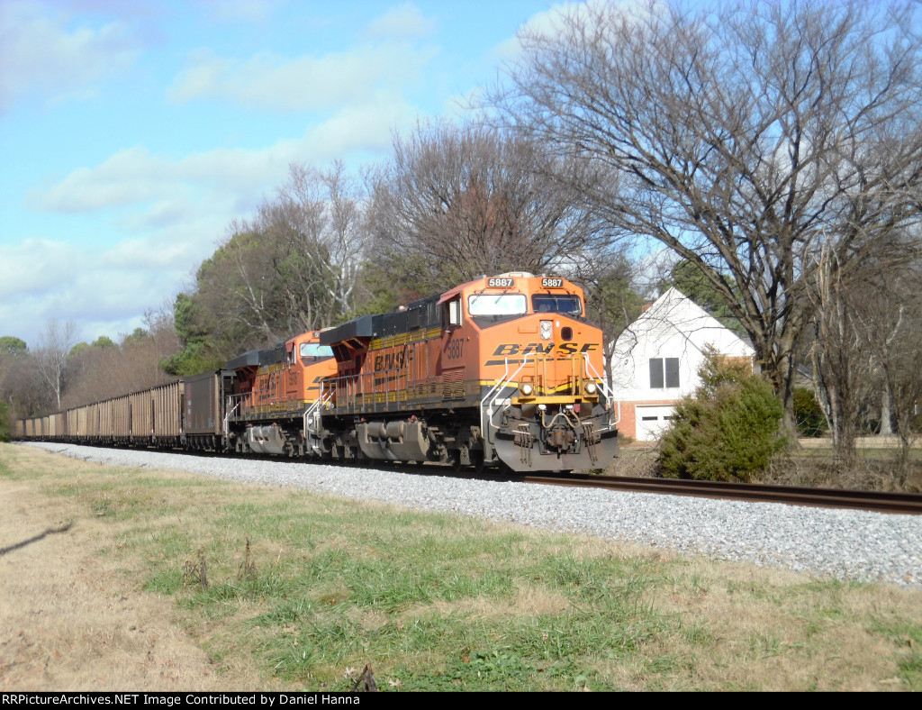 BNSF 5887 leads a loaded coal train east at Germantown TN on a sunny Monday morning